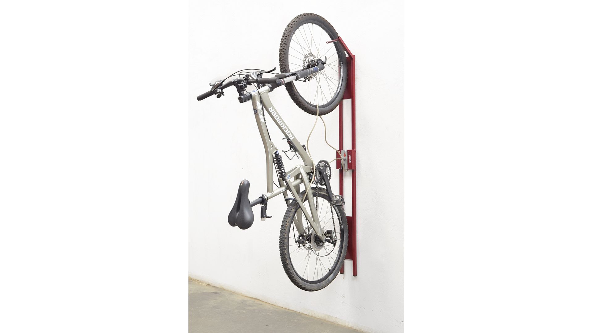 Bike wall hanger with lock